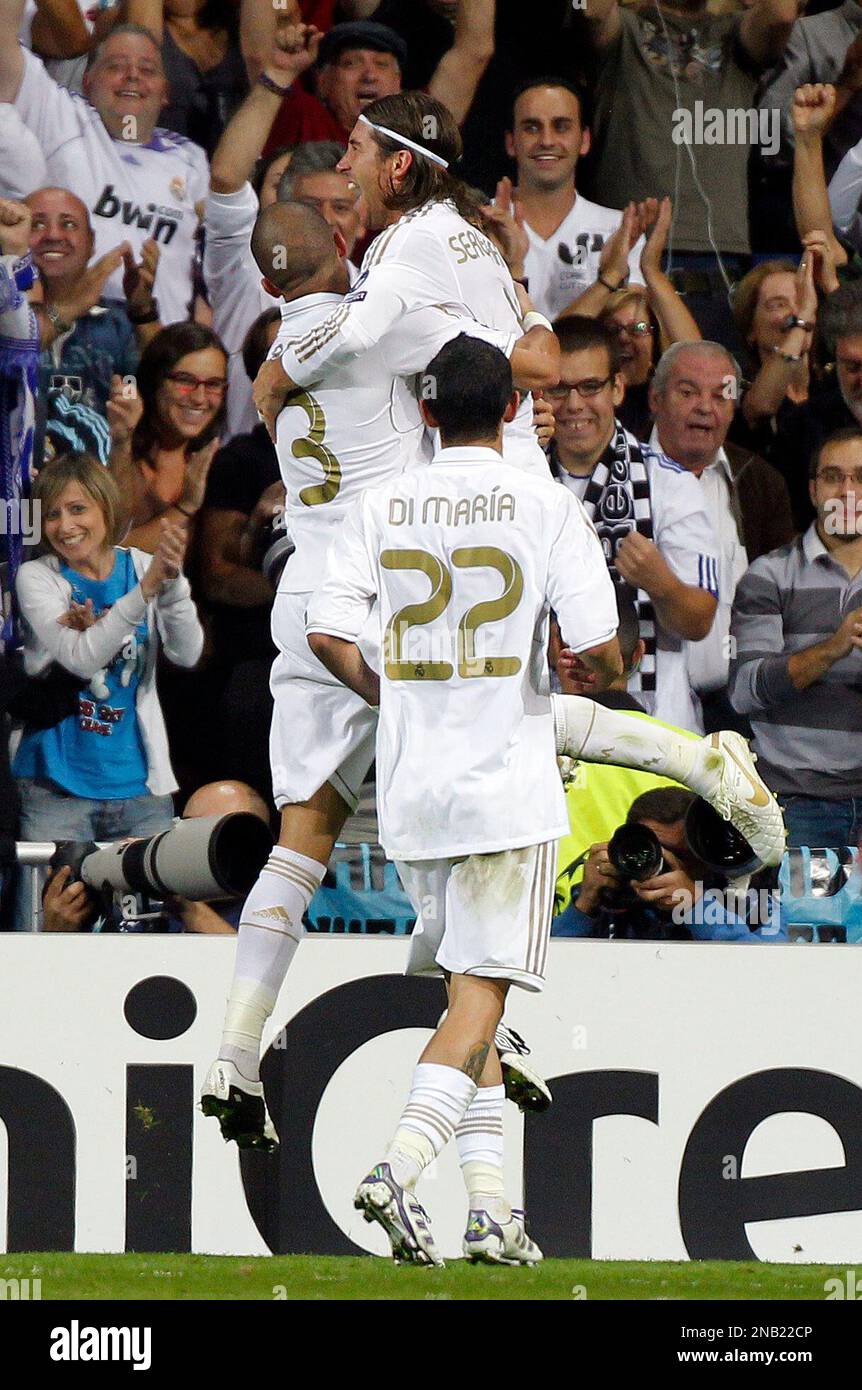 Real Madrid's Sergio Ramos, top right, celebrates his goal with Pepe ...