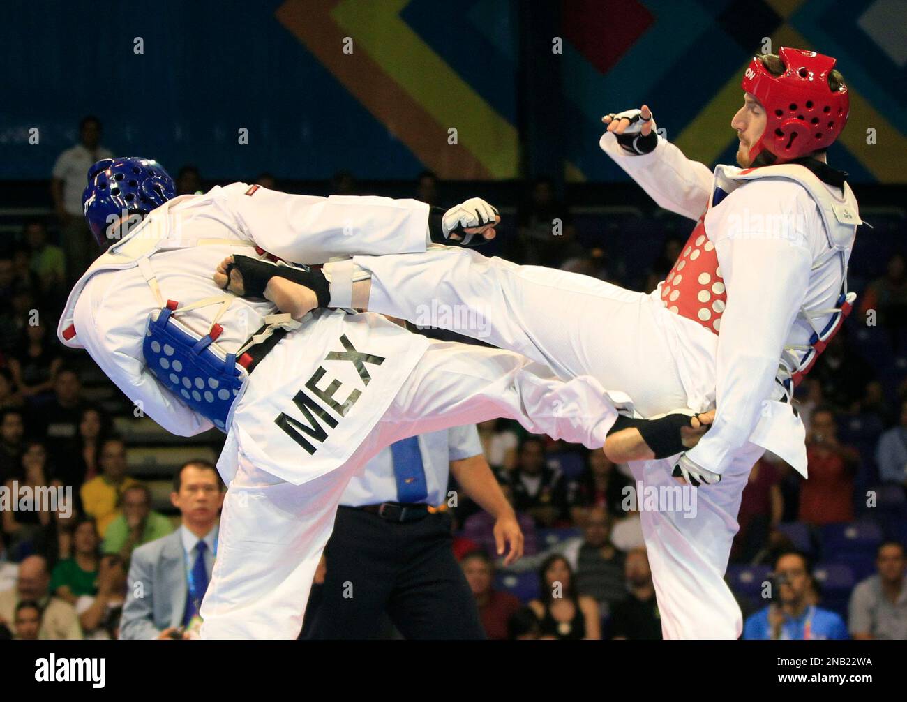 Stephen Lambdin, of the United States, right, fights Mexico's Salvador ...