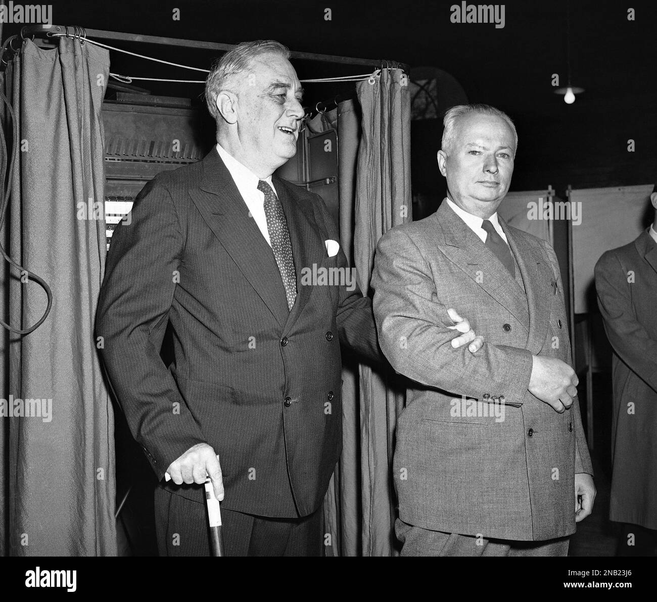 President Franklin D. Roosevelt leaves voting booth with Charles ...