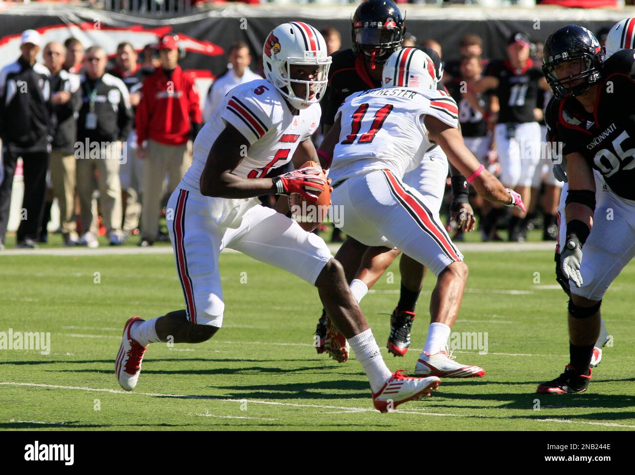 Louisville quarterback Teddy Bridgewater (5) runs against Cincinnati in ...