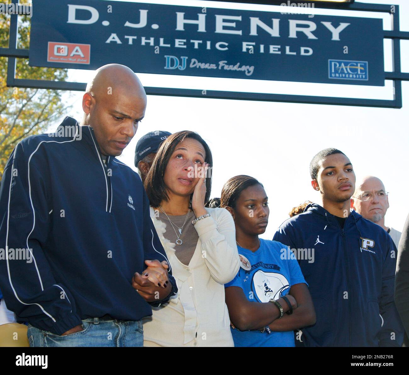 The family of Danroy "D.J." Henry, react during a news conference in ...