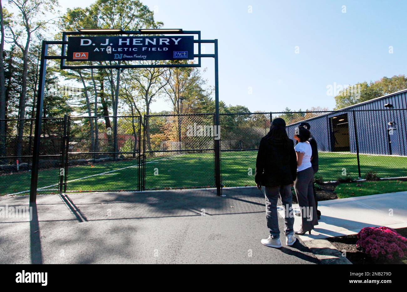 Friends of Danroy "D.J." Henry look at an athletic field named in his ...