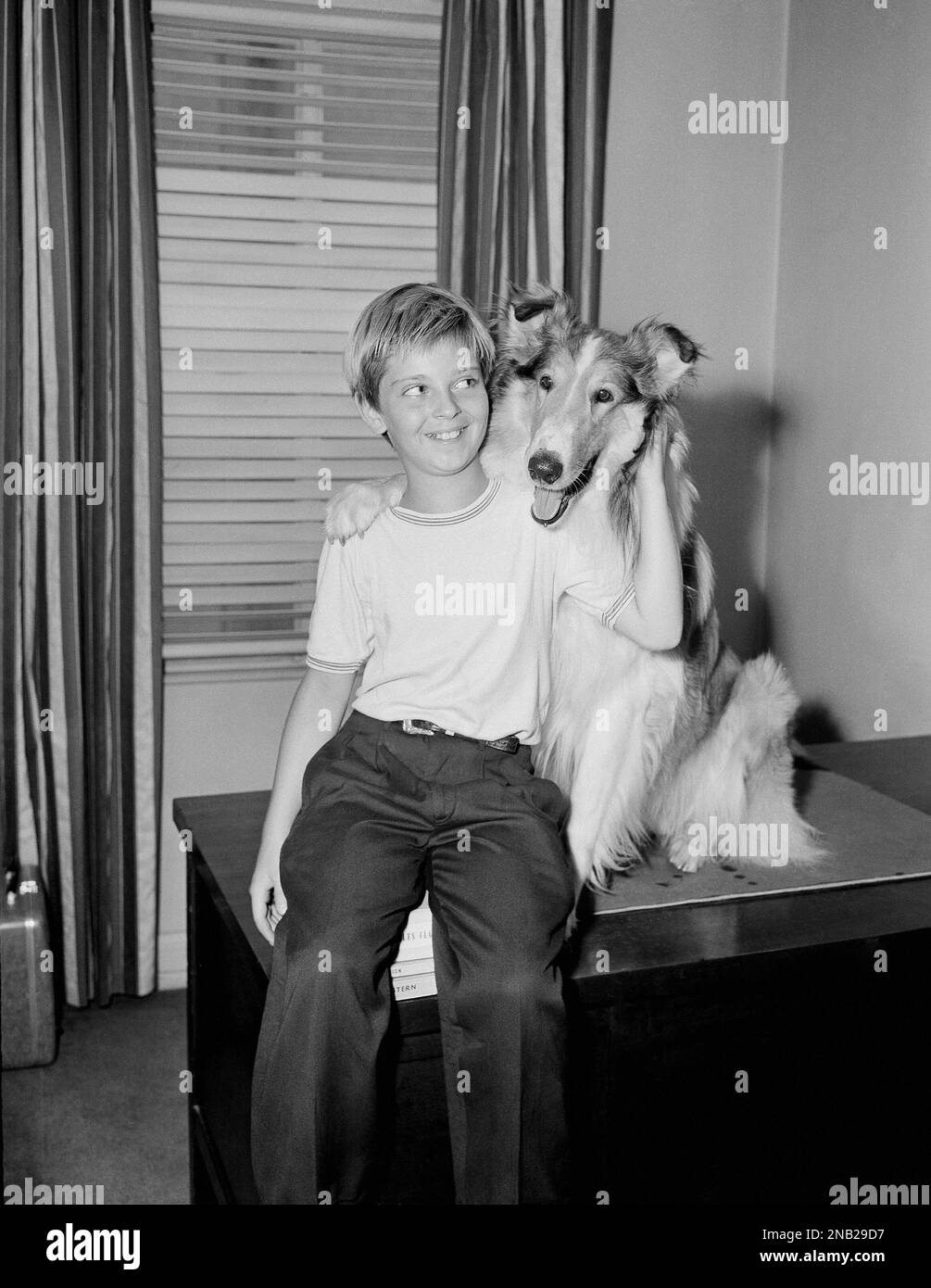 Tommy Rettig, 10-year-old actor from New York, gets a friendly grip ...