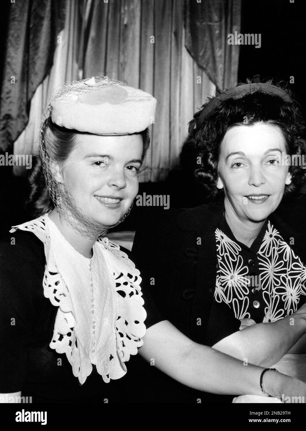 That famous comedian of the silver screen Zasu Pitts (right) proudly ...