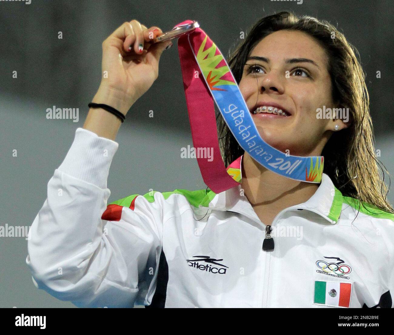 Bronze winner Mexico's Maria Gonzalez holds up his medal during the ...