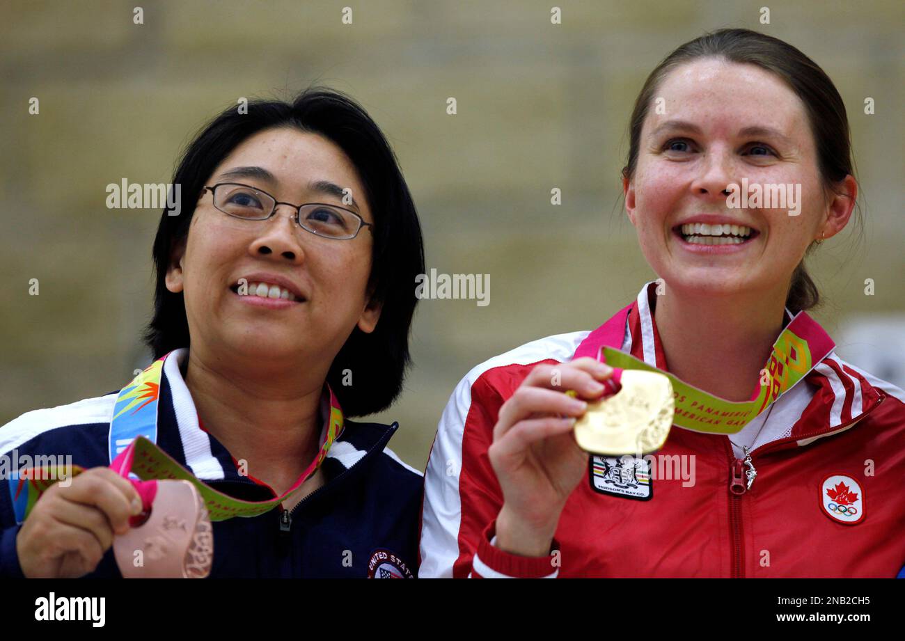 Gold medal winner, Canada's Dorothy Ludwing, right, and bronze medal ...