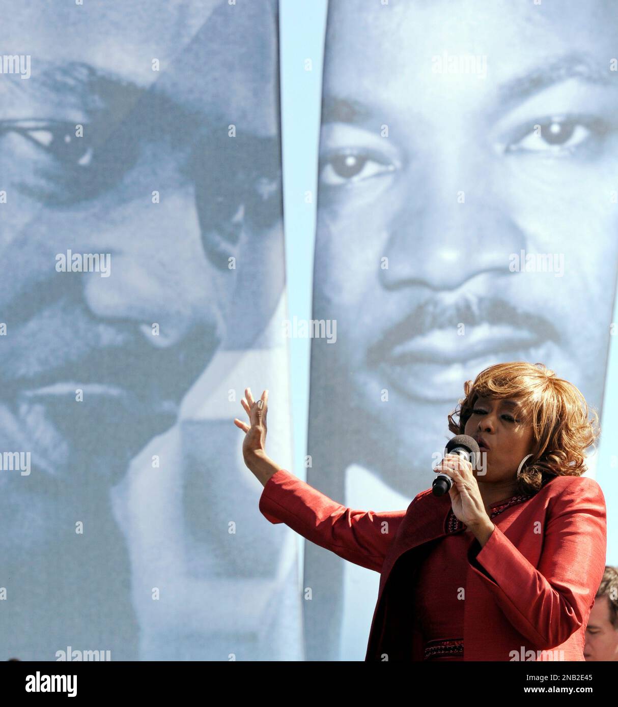 Beneath an image of Martin Luther King, Jr. singer Jennifer Holliday ...