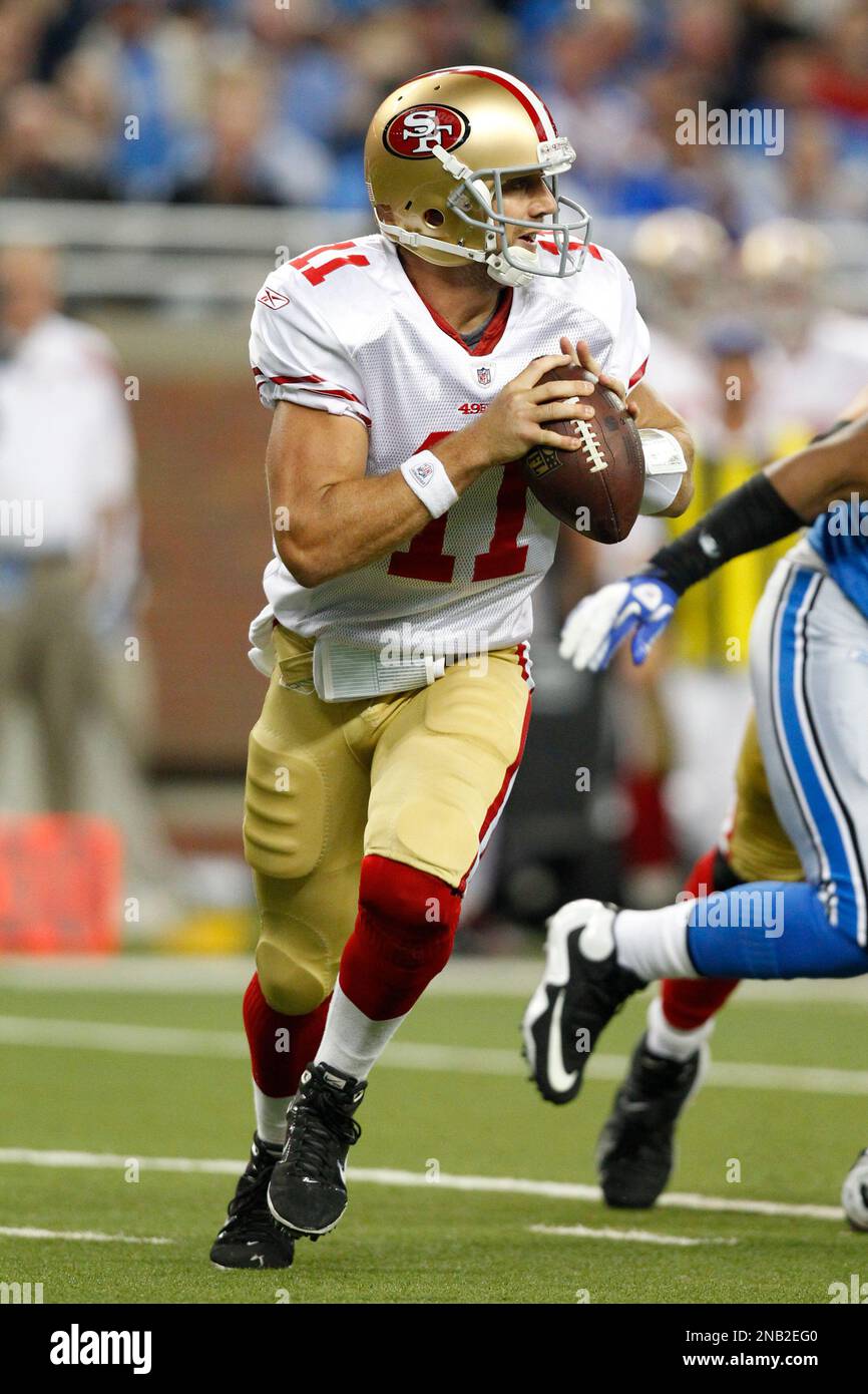 San Francisco 49ers quarterback Alex Smith (11) rolls out to pass in ...