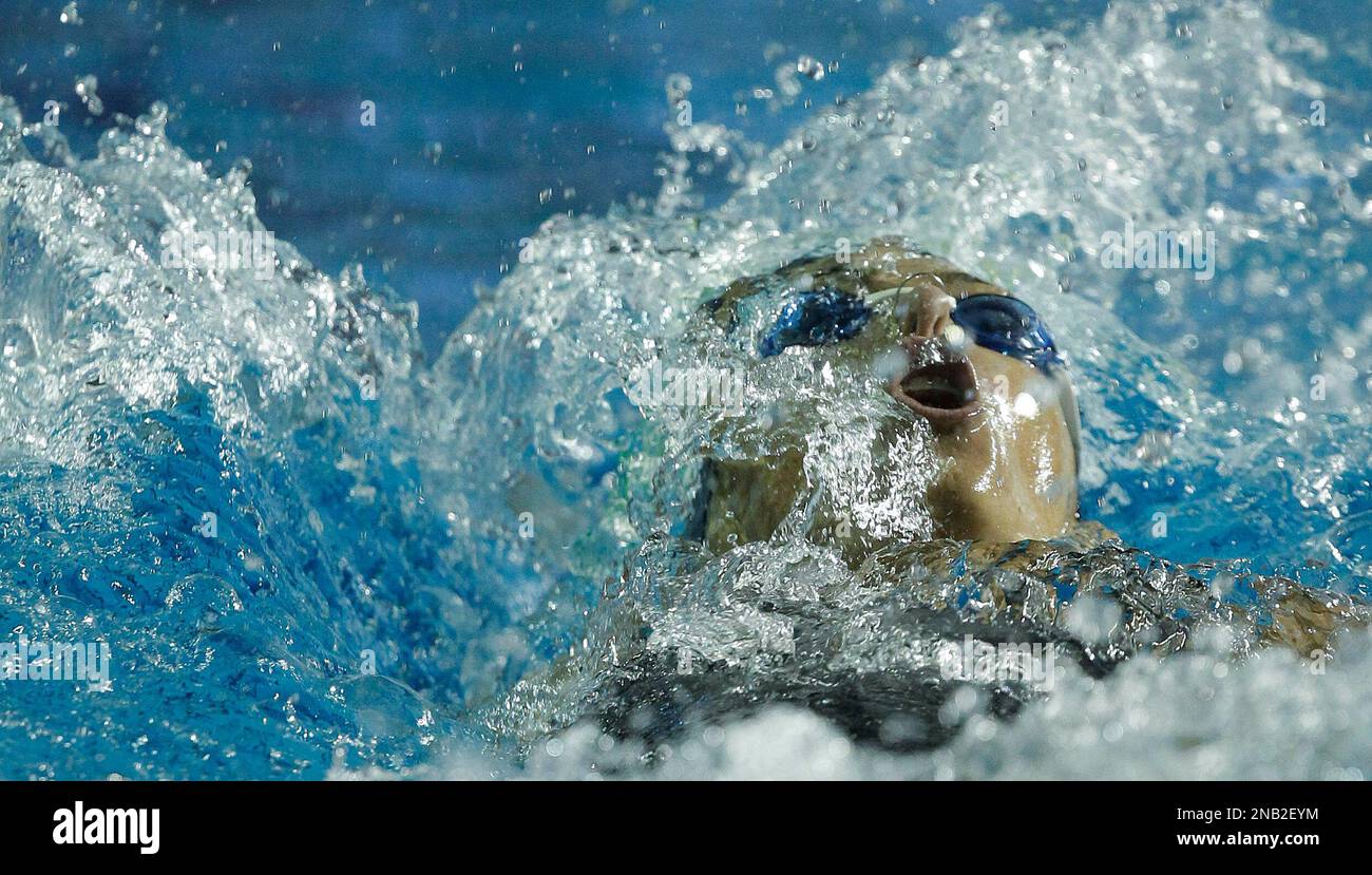 Brazil's Fabiola Molina pushes through the water during a preliminary ...