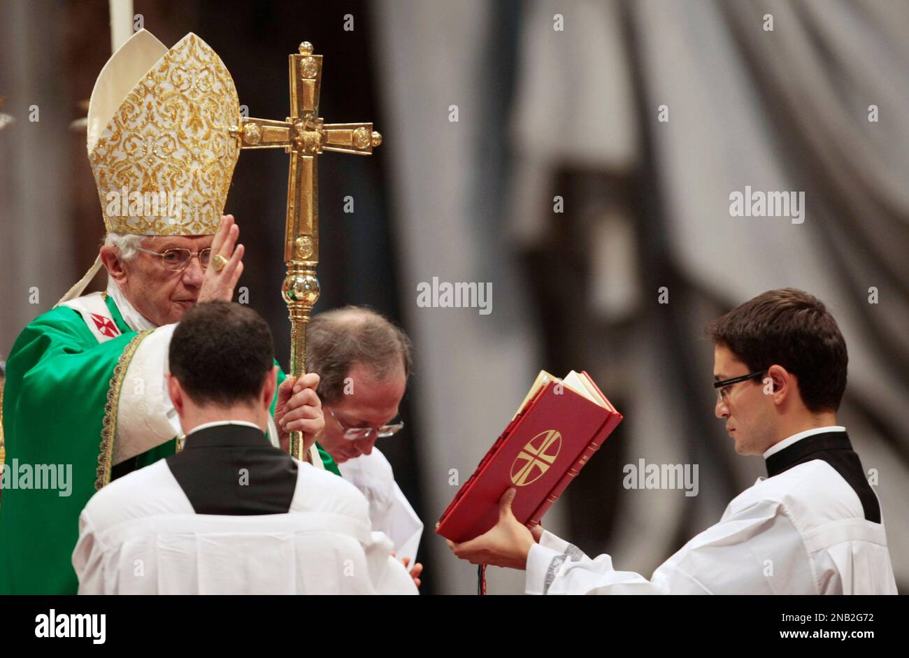 Pope Benedict XVI delivers his blessing in St. Peter's Basilica at the ...