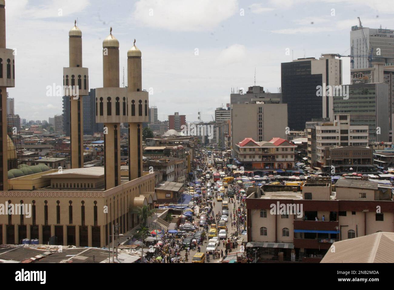 This Oct. 11, 2011 photo shows the central mosque, left, on Lagos ...