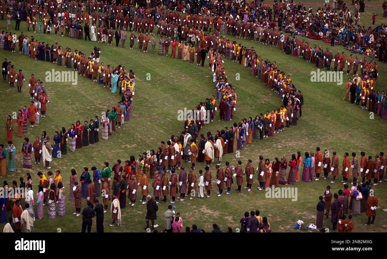 Guests and locals take part the final dance, or Tashi Labay, during ...