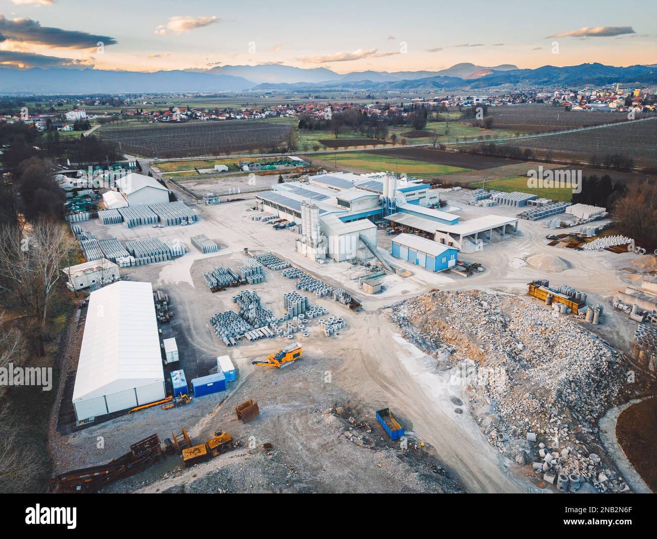 Aerial view of large storage site of construction firm in the suburbs ...