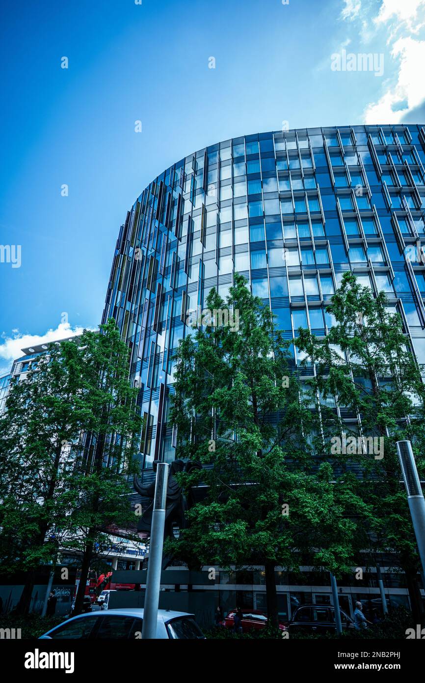 Sleek glass building in downtown Central London Stock Photo - Alamy