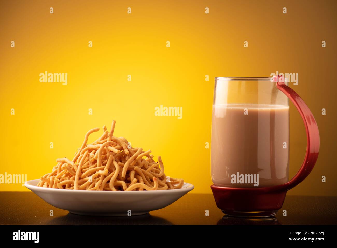 Tea with namkeen on table, indian teatime snack Stock Photo - Alamy