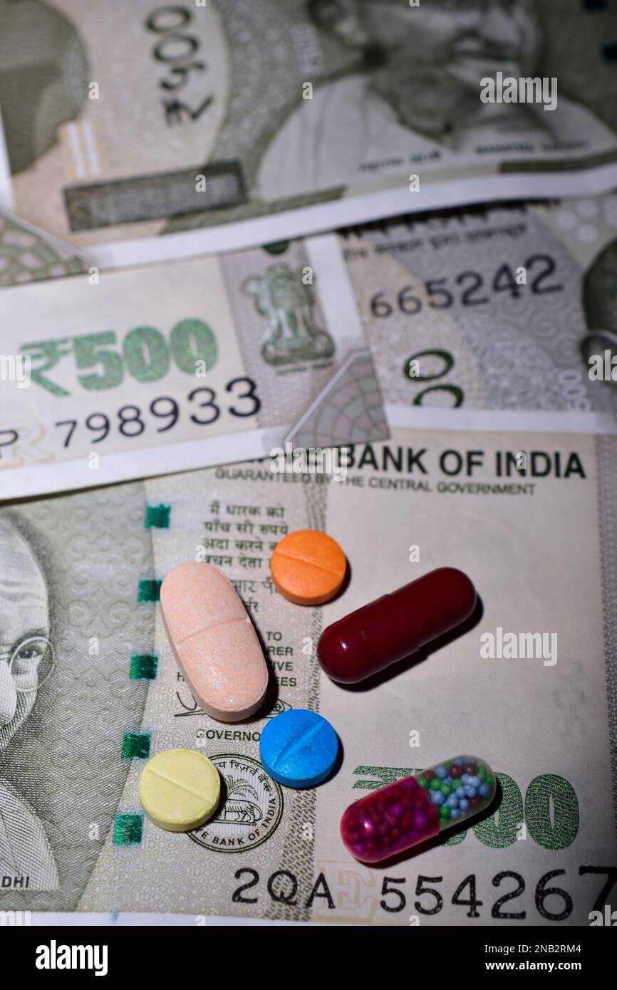 Medicine with indian currency, expensive medication concept Stock Photo ...