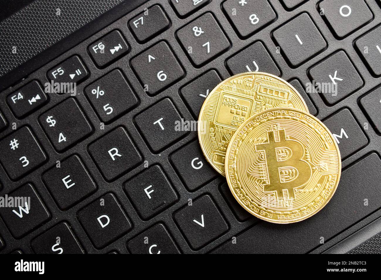Top view of bitcon on keyboard, virtual currency Stock Photo - Alamy