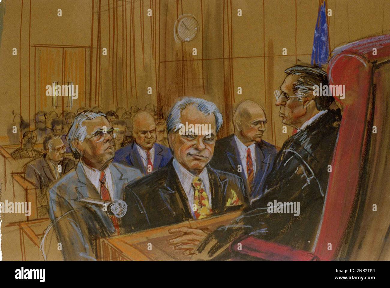 Convicted crime boss John Gotti, center, smirks as his life sentence is ...