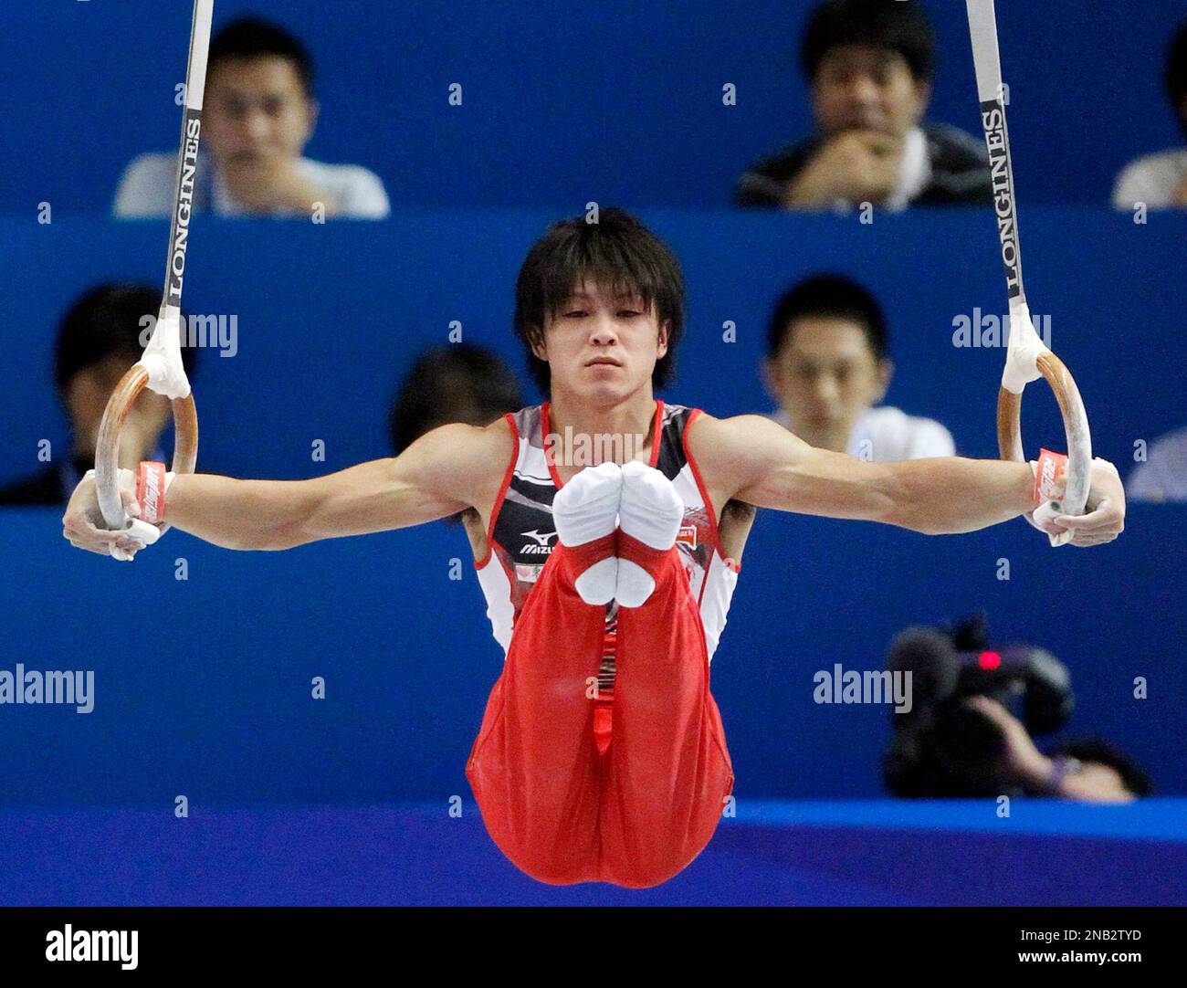 Japan's Kohei Uchimura performs on the rings on his way to winning the ...
