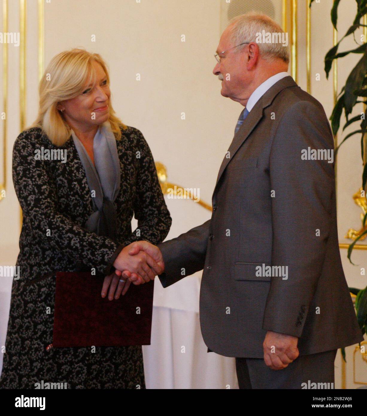 Slovakia's outgoing Prime Minister Iveta Radicova, left, meets with ...