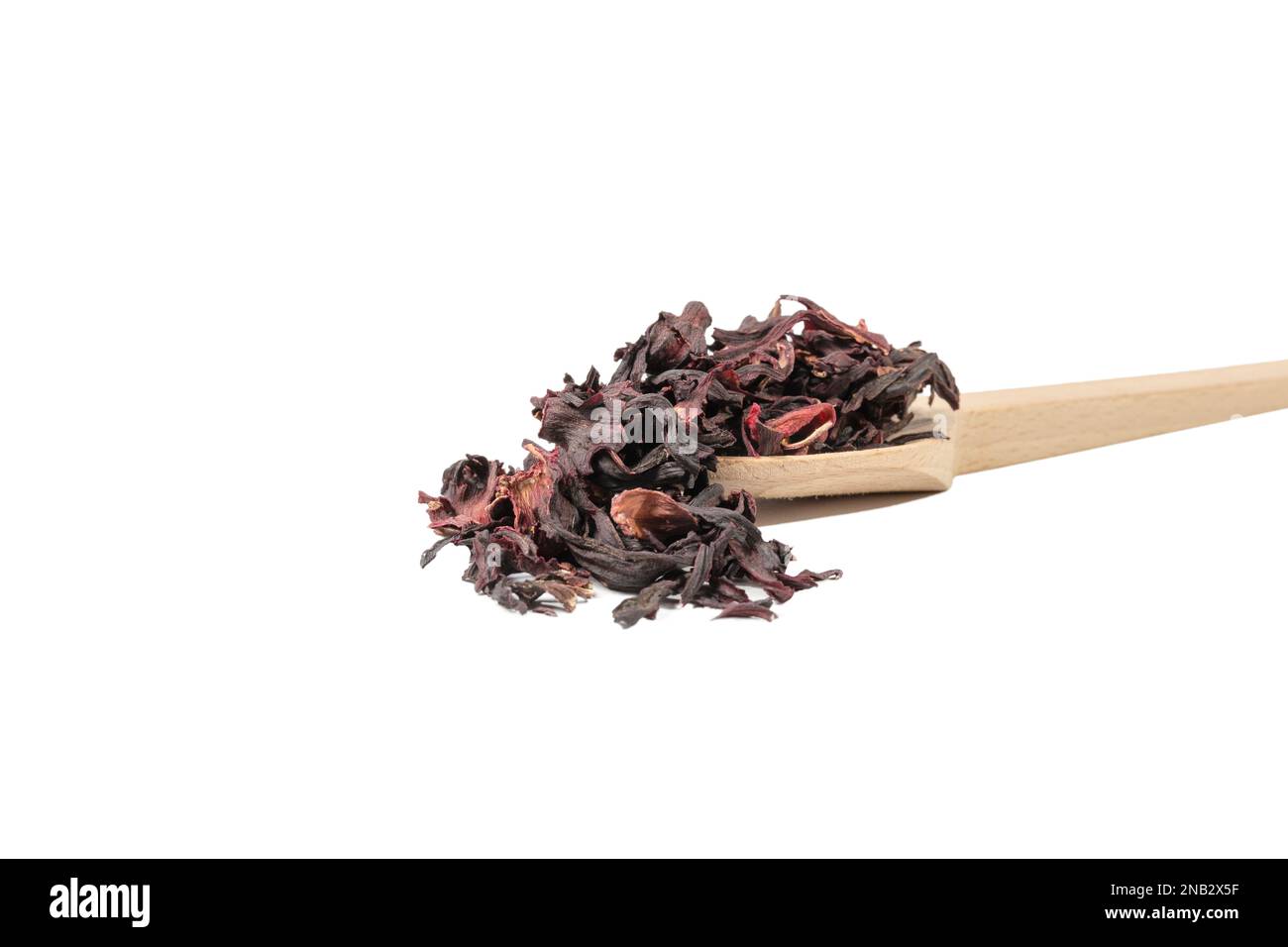 Dry hibiscus tea on wooden spoon isolated on white background. herb. herbal tea. food ingredient ...