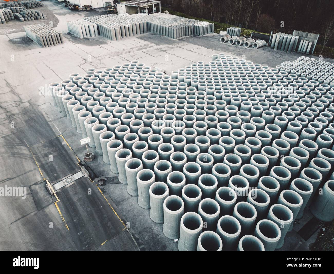 Huge concrete pipes stacked in lines, aerial view Stock Photo - Alamy