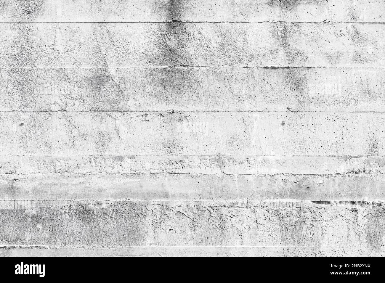 Rough white concrete wall with imprint relief of wooden formwork ...