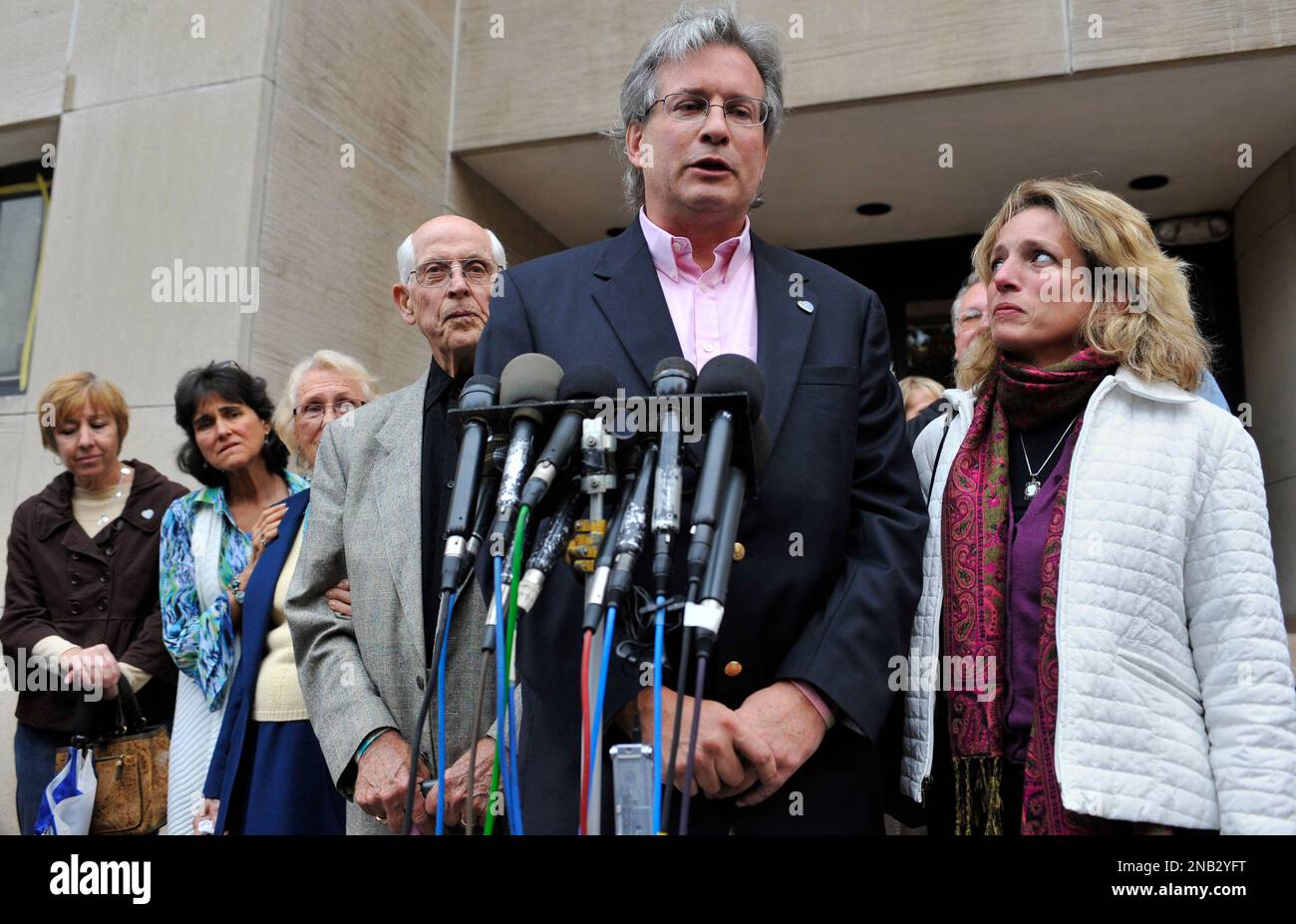 Dr. William Petit Jr., second from right, stands with members of the ...