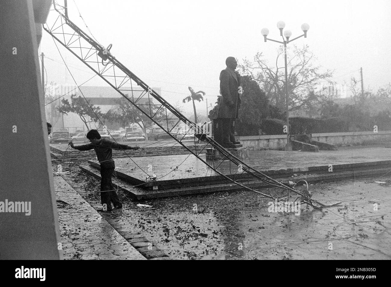 Workman securing a radio tower at city hall in Cancun on Wednesday ...