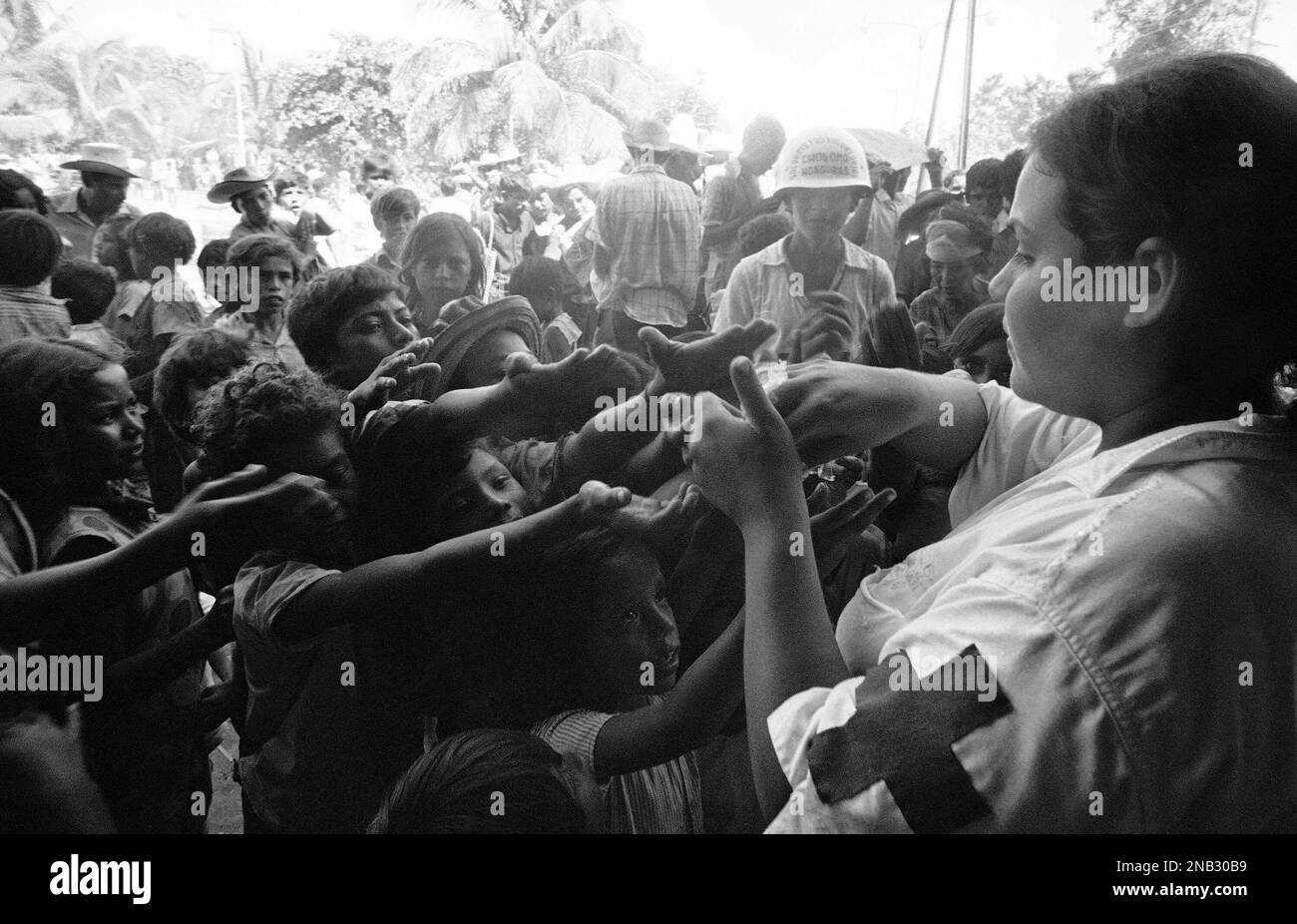Choloma-fifi refugees getting food from Red Cross in September 1974 ...
