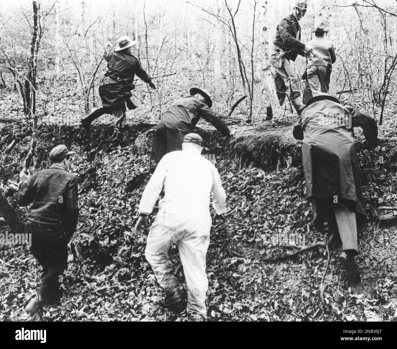 Pennsylvania State policemen, aided by members of a civilian posse ...