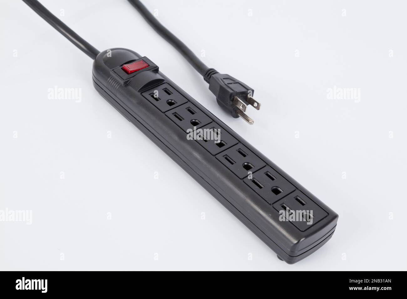 Black surge protector; photo on white background Stock Photo - Alamy