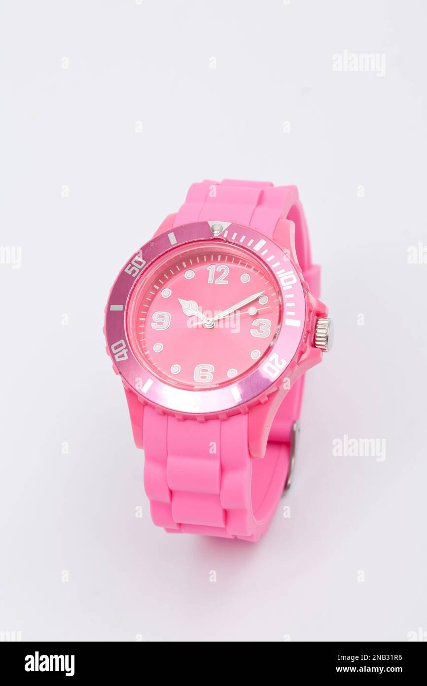 Wrist watch pink on white background Stock Photo - Alamy