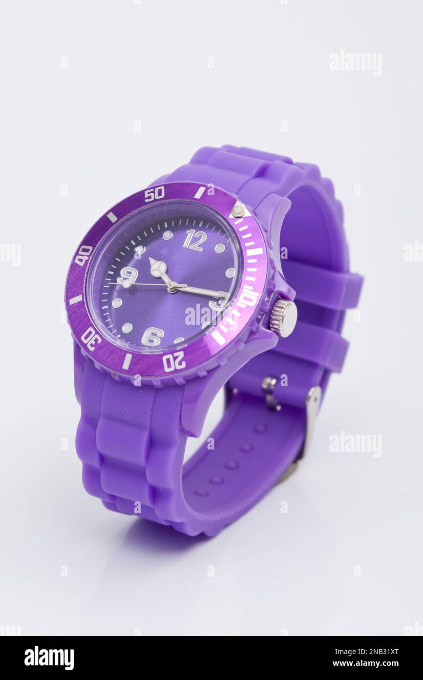Wrist watch purple on white background Stock Photo - Alamy
