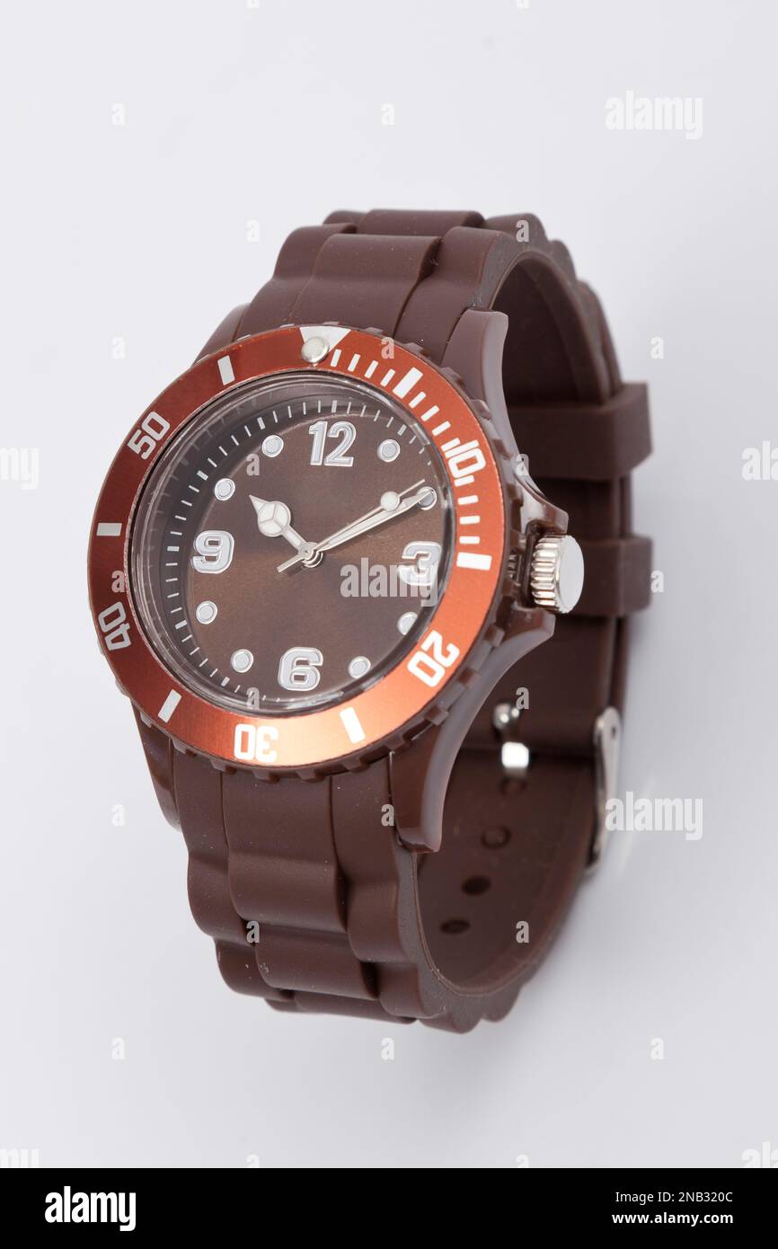 Wrist watch brown on white background Stock Photo - Alamy