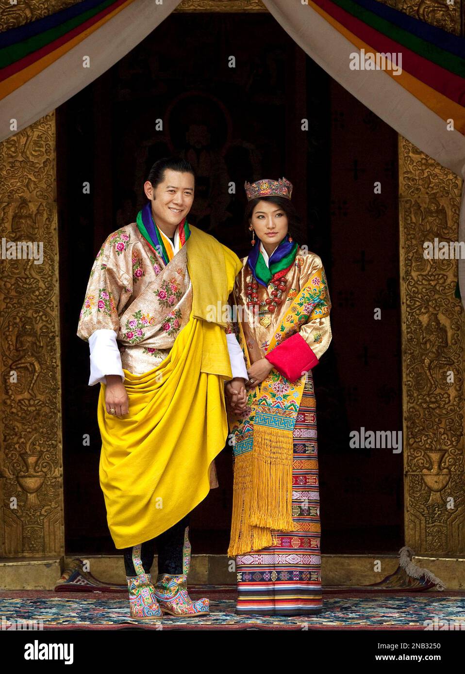 King Jigme Khesar Namgyal Wangchuck, left and Queen Jetsun Pema pose after they were married at ...
