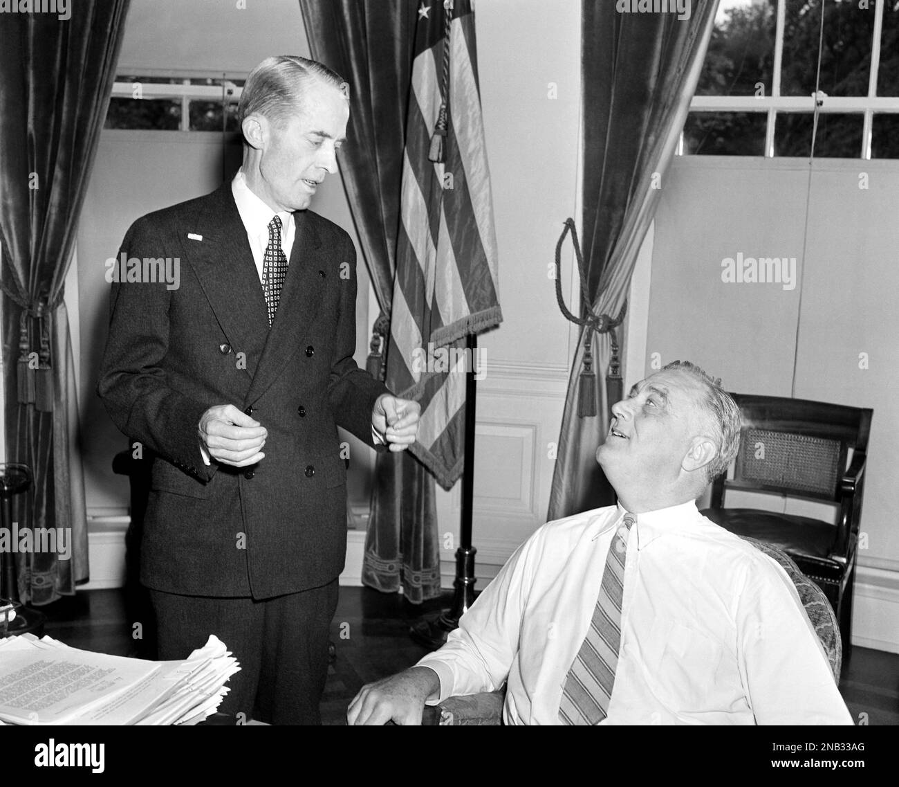 President Franklin D. Roosevelt greets his secretary Marvin McIntyre ...