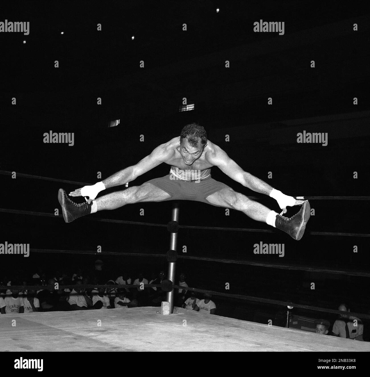 World Lightweight boxing champion Carlos Ortiz leaps in ring at New ...