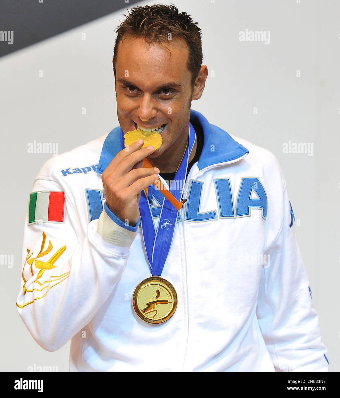 Italy's Paolo Pizzo celebrates on the podium after winning a gold medal ...