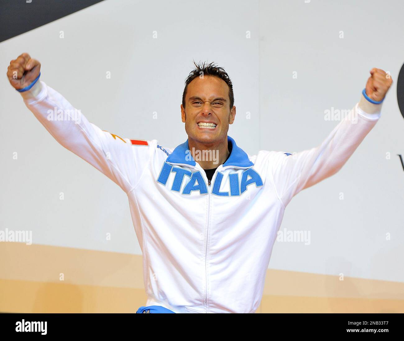 Italy's Paolo Pizzo celebrates on the podium after winning a gold medal ...