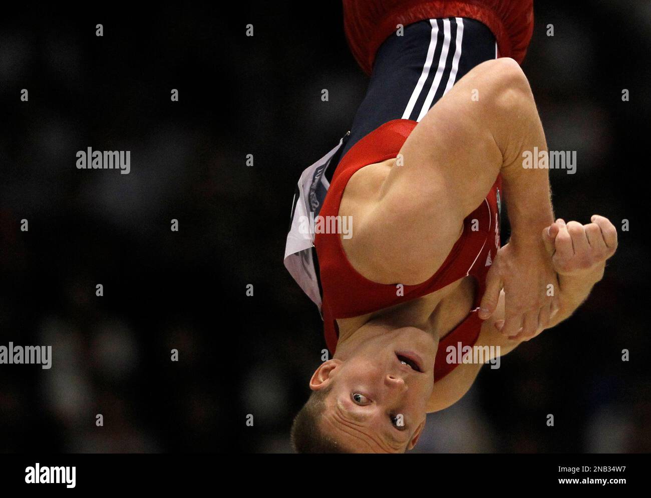 USA's Steven Legendre performs the floor exercise during the men's team ...
