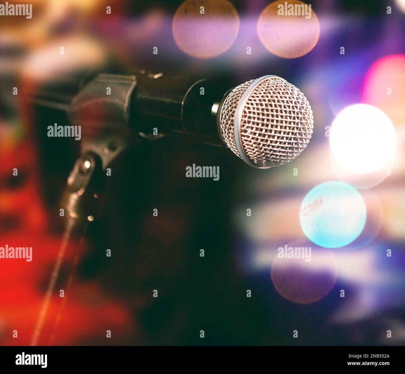 Live music background.Microphone and stage lights.Microphone and stage ...