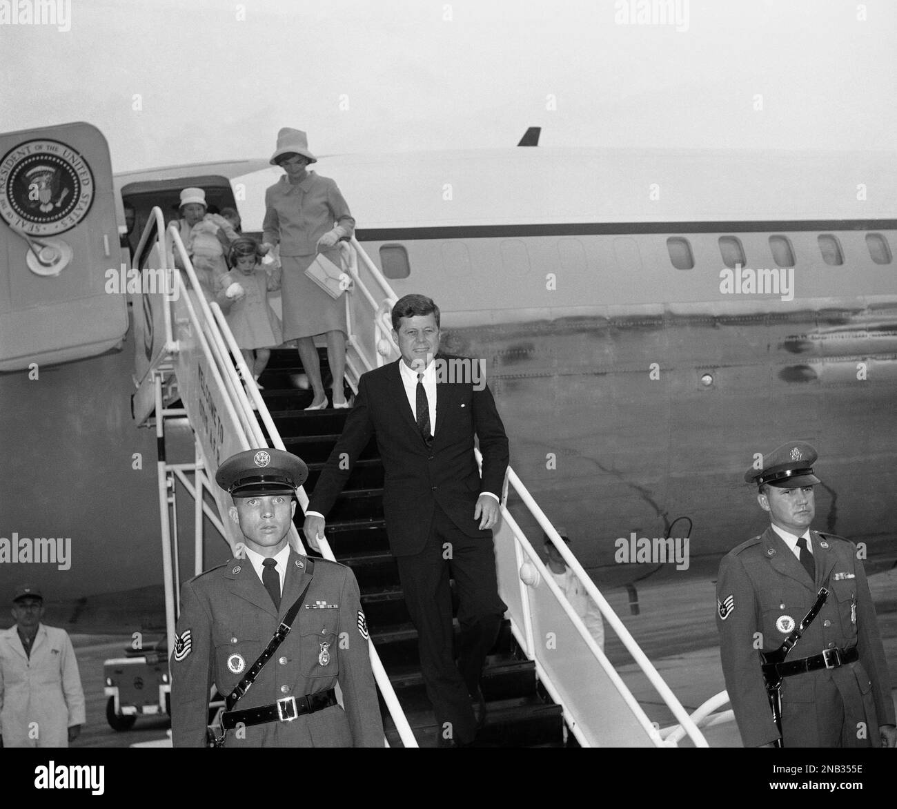 President John F. Kennedy leaves his plane at Otis Air Force Base, Mass ...