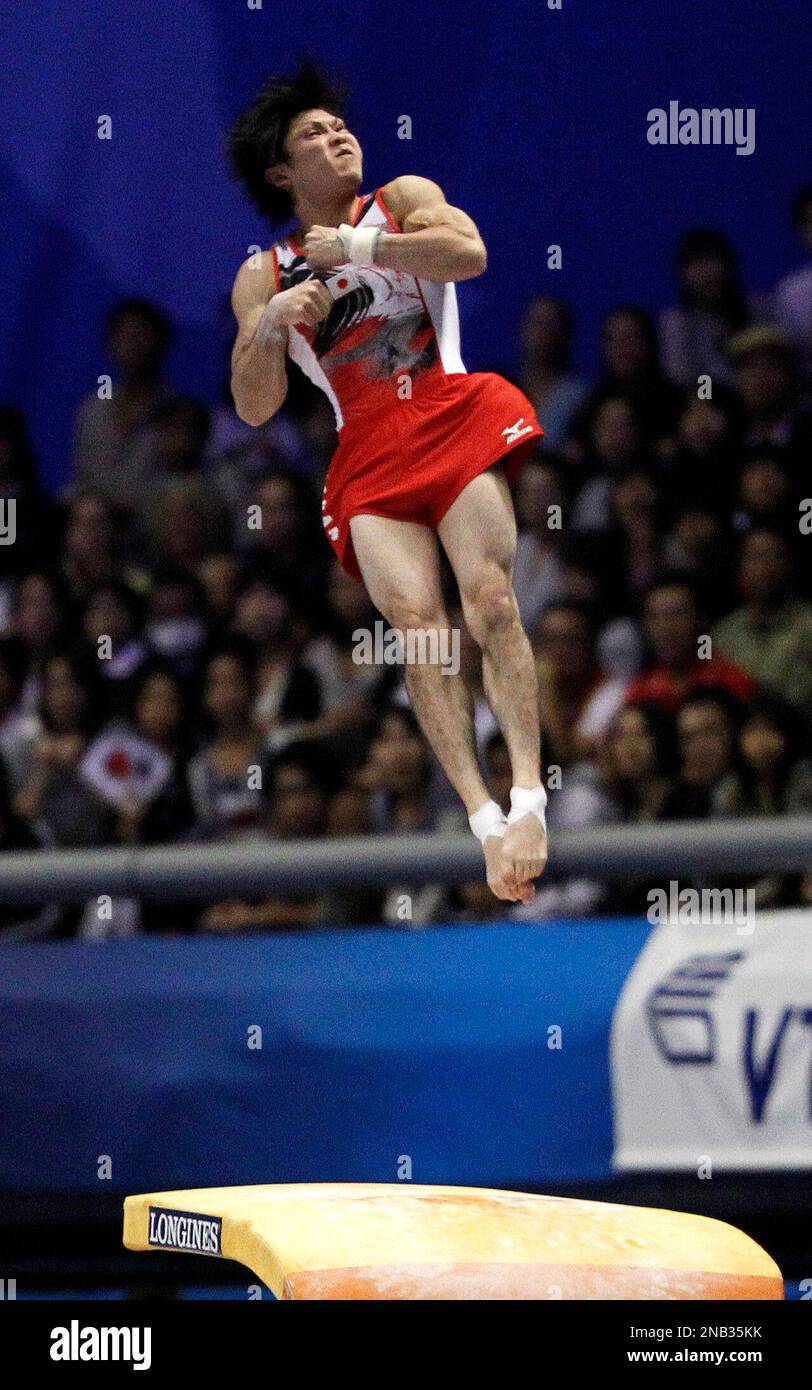 Japan's Kohei Uchimura performs on the vaulting table during the men's ...