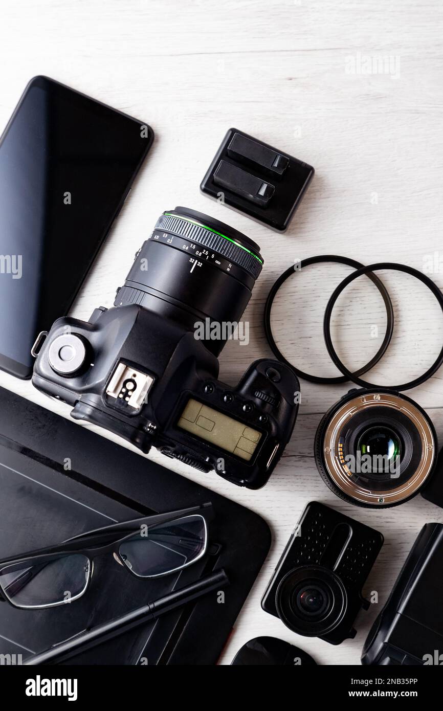 Digital photo workstation over white background.Top view of digital ...