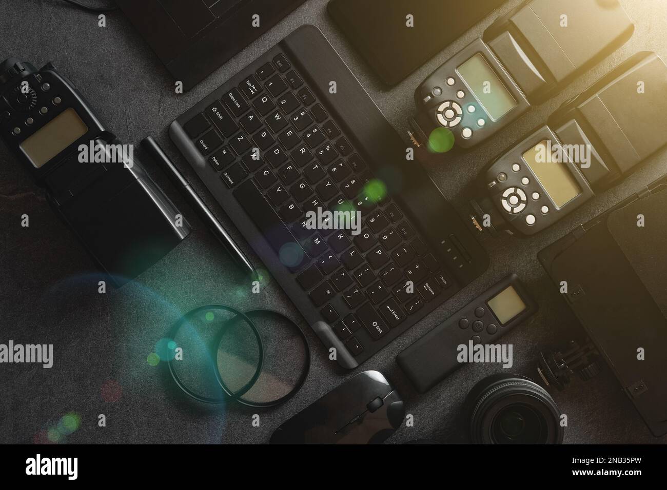 Digital photo workstation over black background.Top view of digital ...