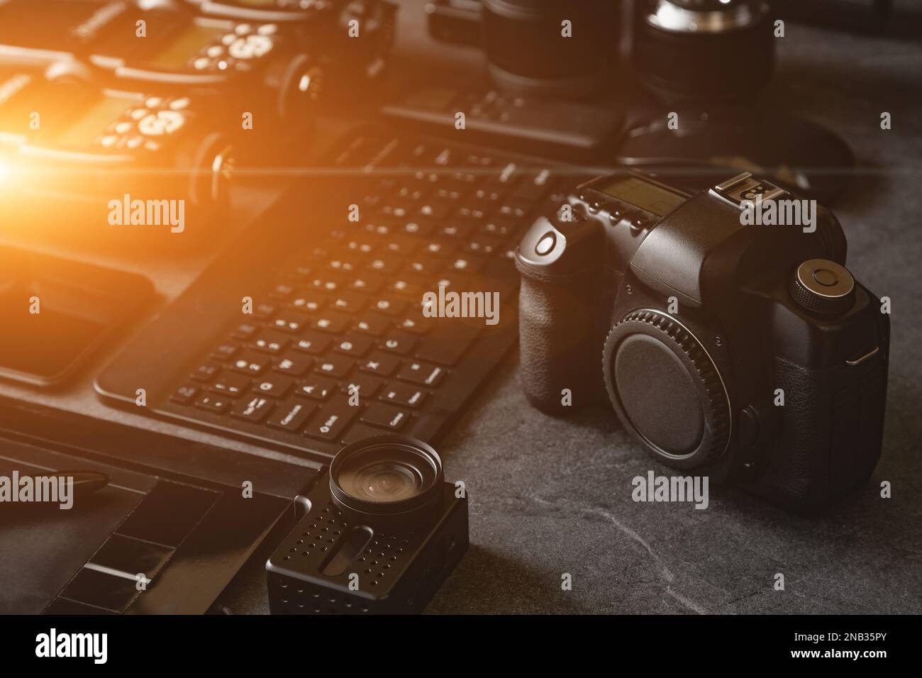 Digital photo workstation over black background.Top view of digital ...