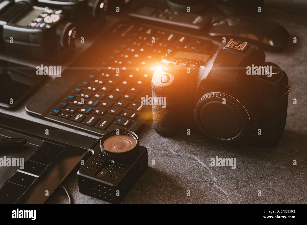 Digital photo workstation over black background.Top view of digital ...