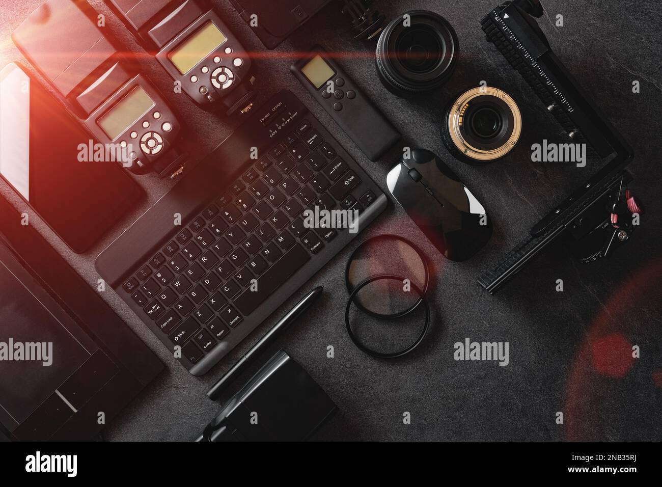 Digital photo workstation over black background.Top view of digital ...