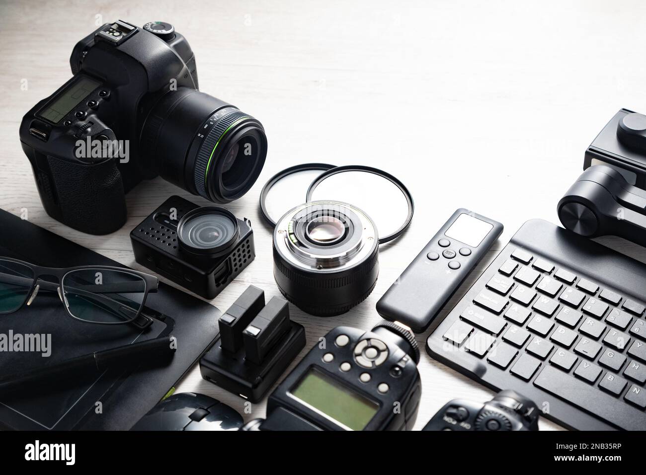 Digital photo workstation over white background.Top view of digital ...